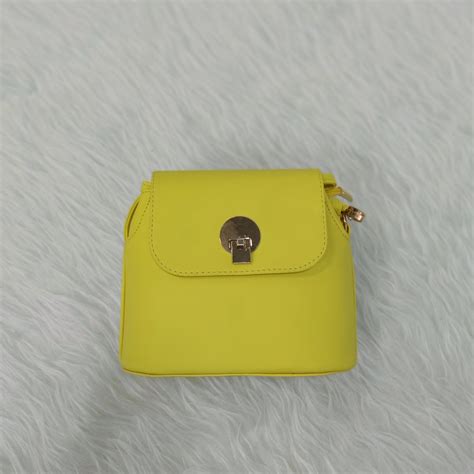 خرید و قیمت کیف کوچک دوشی بندی زنانه دخترانه زرد روشن از غرفه کیف و کفش
