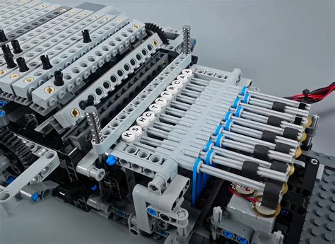 engineer builds functional lego drum machine that triggers drumming