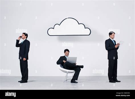 Businessmen Using Wireless Devices With Cloud Computing Network Stock Photo Alamy
