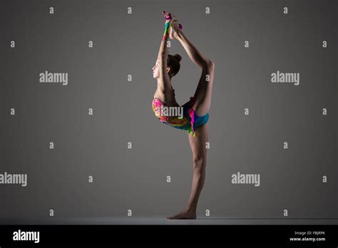 Beautiful Cool Young Fit Gymnast Woman In Colorful Sportswear Working