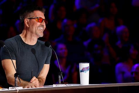 Why Simon Cowell Wears Those Red Glasses On Agt