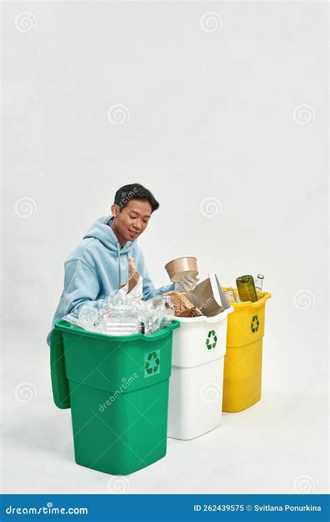 Man Sort Garbage In Glass Plastic And Paper Bins Stock Image Image Of Separation Protection