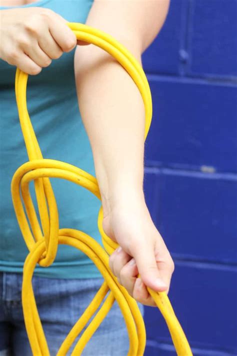 How To Wrap An Extension Cord Like A Boss Power Cord Storage Extension Cord Power Cord Organizer