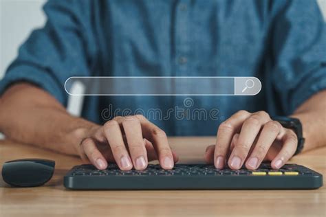 Man Using A Computer Keyboard To Searching For Information With The Search Bar Web Browser