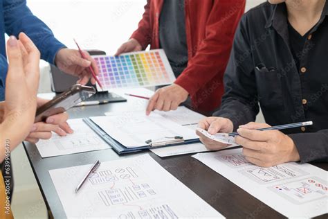 Team Of Ui Ux Web Designer Are Working Together To Develop Mobile