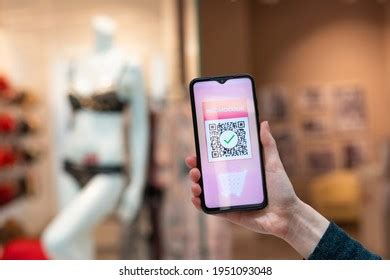 Womans Hand Holds Cellphone Qr Code Stock Photo 1951093048 Shutterstock