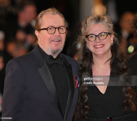 British Actor Gary Oldman And His Wife Gisele Schmidt Arrive For The