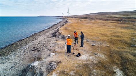 Scientists Conducting Research On Wind Patterns At Coastal Site Stock Photo Image Of