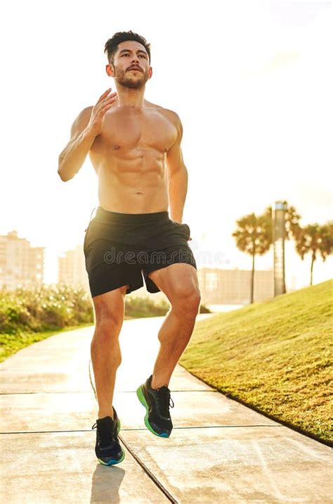 Fitness Topless And Man Running In Park For Cardio Challenge And Training For Marathon At