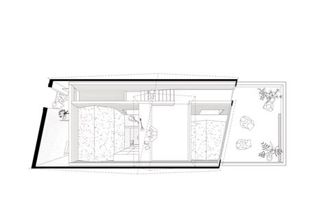 skinny dwelling between two existing houses dezeen