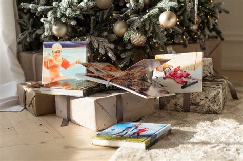 Photo Book Album Under The Christmas Tree Surrounded By Christmas Ts