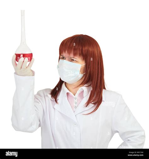 The Woman A Scientist Studying The Chemical Solution In The Flask Stock Photo Alamy