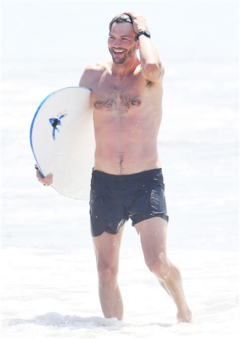 Ashton Kutcher Goes Shirtless As He Surfs Photos Hollywood Life