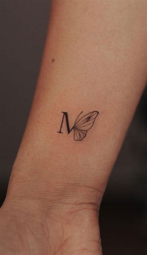 70 Beautiful Tattoo Designs For Women M Initial Butterfly Wing