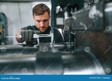 Using Measure Tool Man In Uniform Is In Workstation Developing Details