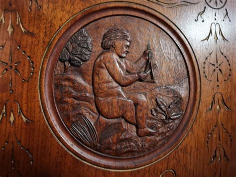 Bruce Talbert Attr An Ebonised Side Cabinet Carved With Putti Playing The Lute For Sale At 1stdibs