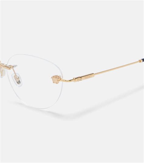 Round Glasses In Gold Versace Mytheresa