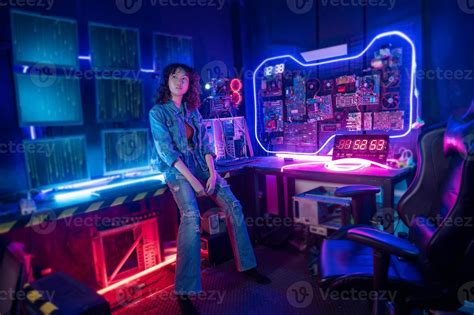 An Asian Woman Programmer Is Working In Her Computer Room Futuristic
