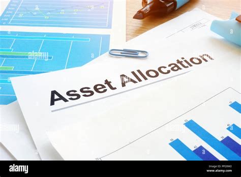 Asset Allocation Financial Documents And Pen On An Office Desk Stock