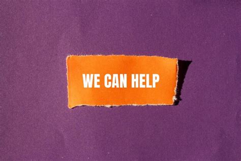 Premium Photo We Can Help Message Written On Ripped Torn Orange Paper