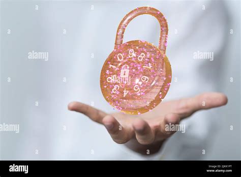 A Hand Holding An Illustrative Lock The Concept Of Cybersecurity Of Digital Network Systems