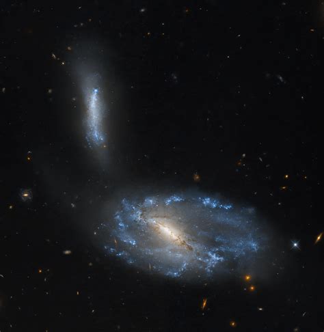 Hubble Captures New Image Of Two Colliding Galaxies Nasas Hubble