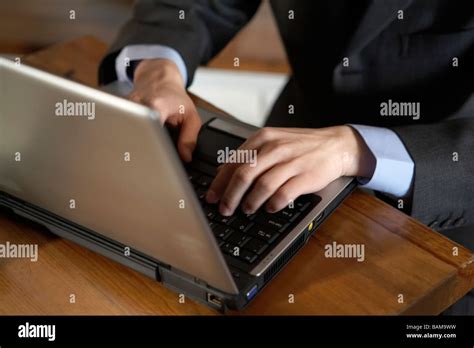 Man Typing On Laptop Computer Stock Photo Alamy