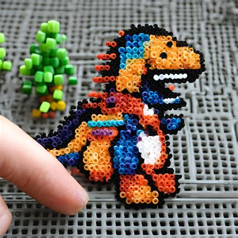 10 Dinosaur Perler Beads Patterns For Prehistoric Fun Diy Crafts