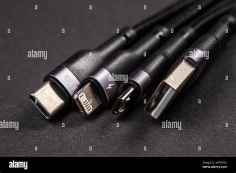 Digital Computer Or Smartphone Cables Usb Type C Mini Usb Lightning Connector On Dark