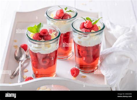 Homemade Red Jelly Made Of Gelatin And Fruits Jelly With Whipped Cream