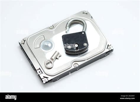 Computer Hard Disks And Open Metal Padlock Symbolizing Concept For Encrypted Data Cyber