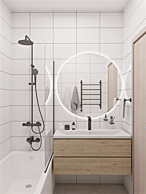 Белая плитка в ванной с черной затиркой и сантехникой