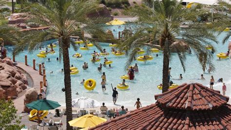 People Play In The Wave Pool At The Arizona Grand Resorts Oasis Water