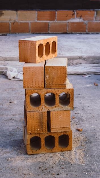 Premium Photo Stack Of Objects On Field