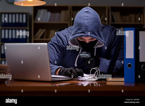 Hacker Stealing Personal Data From Home Computer Stock Photo Alamy
