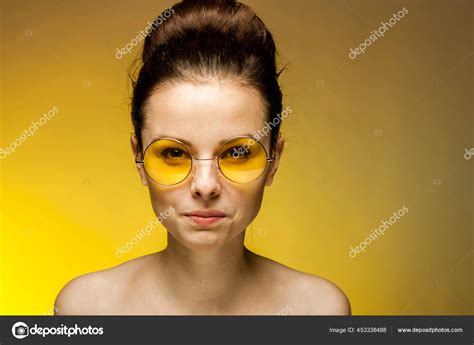 Pretty Woman With Bare Shoulders In Yellow Glasses Emotions Attractive Look Stock Photo By