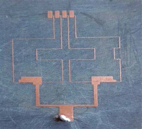 Fabricated Microstrip Tchebyscheff Phased Array At Millimeter Wave
