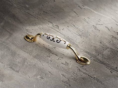 Ручка меблева кераміка золото — ціна 35 грн у каталозі Меблева