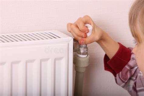 Girl Try Open Thermostat Stock Photo Image Of Blond 7888378