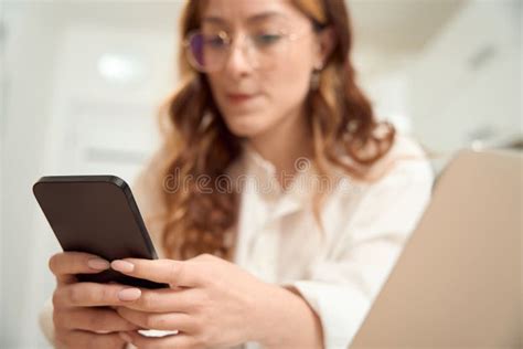 Concentrated Female Tapping With Both Hands On Smartphone Touch Screen Stock Image Image Of