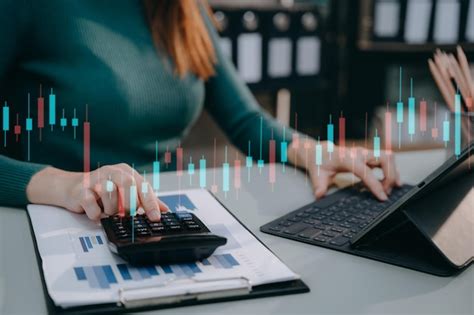 Premium Photo Women Working On Desk Office With Using A Calculator To Calculate The Numbers