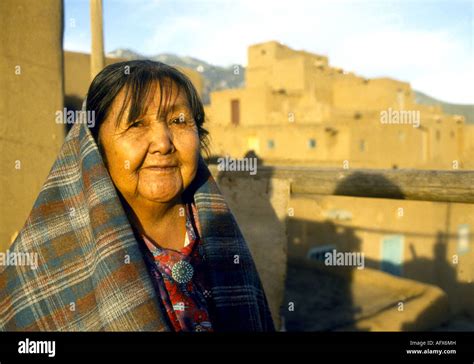 An Elderly Woman Who Lives In The Tiwa Pueblo Taos Located In Taos New