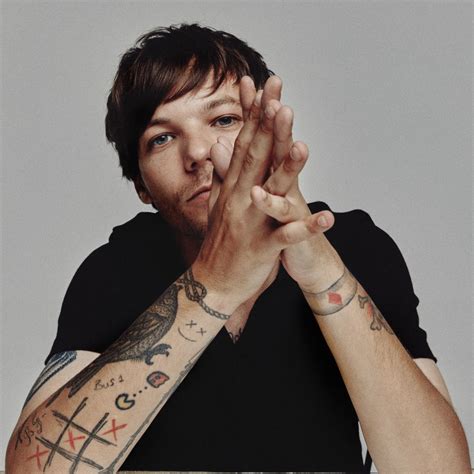 Louis Tomlinson Smiley Face Tattoo