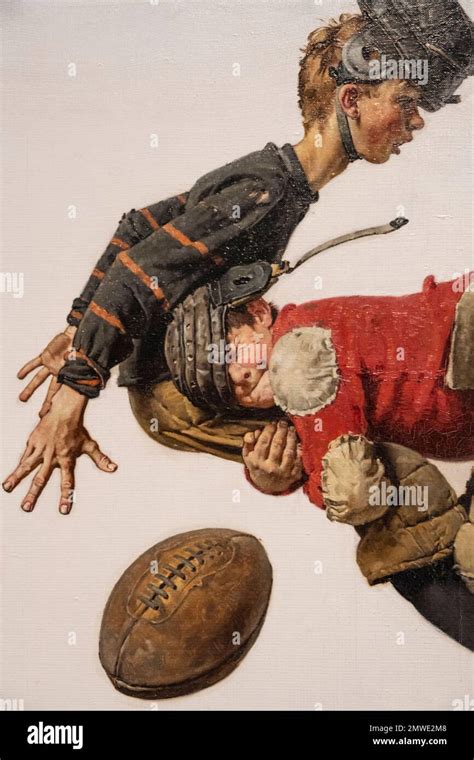Das Gemälde von Norman Rockwell trägt den Titel „Boy Making Football ...