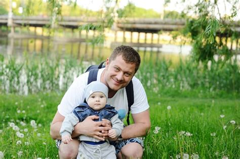 Premium Photo Dad Plays With Young Son