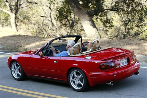 Exclusive Jay Leno Drives A Red Supercharged Mazda Miata Convertible While Filming Scenes