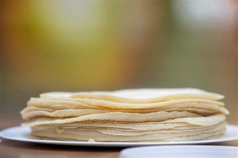 Thin Pancakes Stacked On A Plate Premium Photo