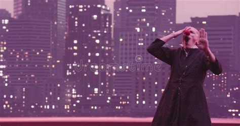 Clown Funny Mime Behind An Invisible Glass Box Or Wall Entering The Invisible Door Stock