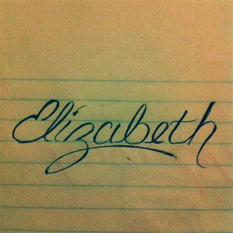 Elizabeth In Cursive Calligraphy On Lined Paper