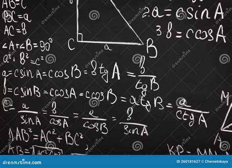 Different Mathematical Formulas Written With Chalk On Blackboard Stock
